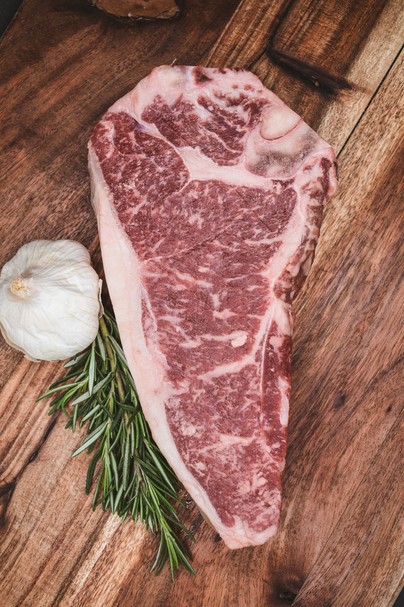 PRIME Bone-In New York Steak – The Herd